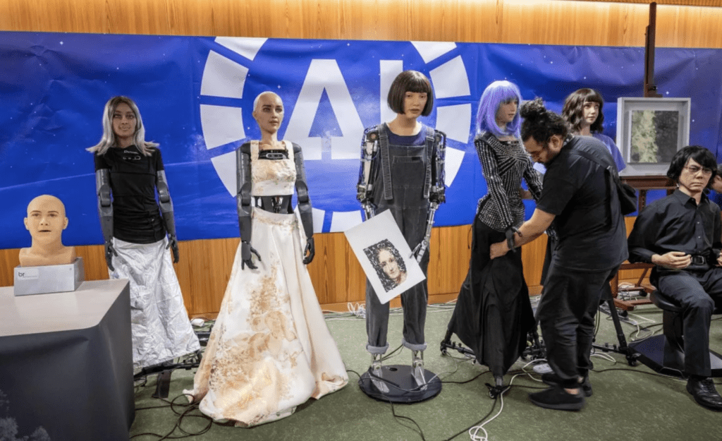 Robots say they won’t rebel against humans as dozens gather at ...